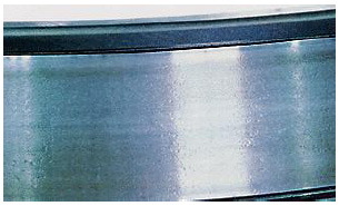 Deleterious Particles in Lubricating Grease